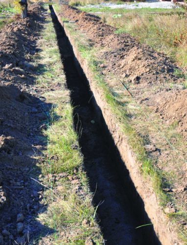 How to Build a Swale for Drainage - Grit